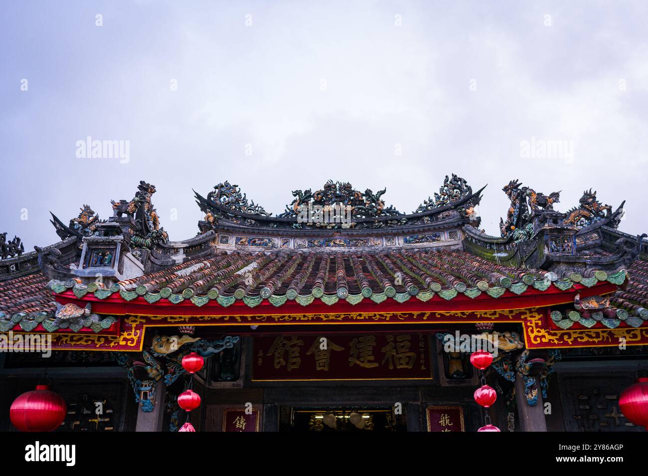 Fukian Assembly Hall in the Hoi An ancient town, Vietnam, at sunset ...
