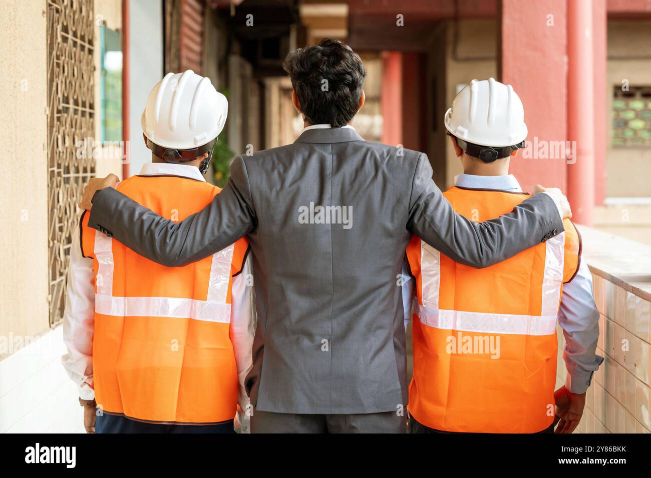 A construction team, including an architect, site engineer, and ... A construction team, including an architect, site engineer, and ...
