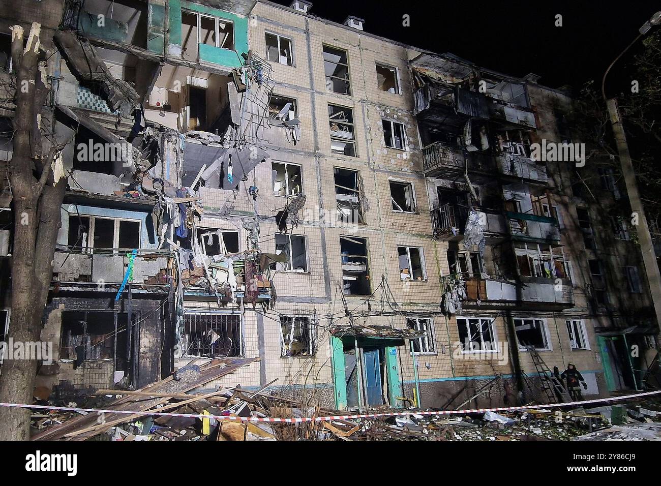 KHARKIV, UKRAINE - SEPTEMBER 03, 2024 - A residential building damaged ...