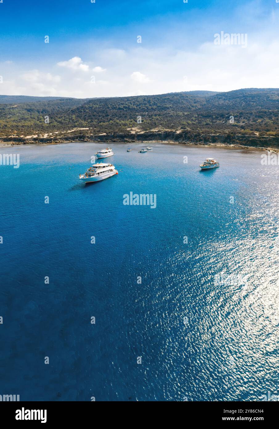 Tourist cruise boats are floating in Blue Lagoon near Latchi. Polis ...