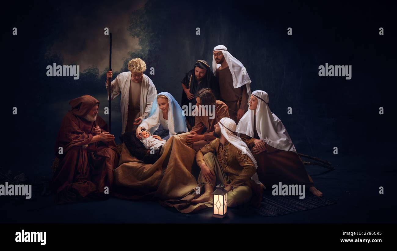 Serene nativity scene, with Mary and Joseph gazing tenderly at baby ...