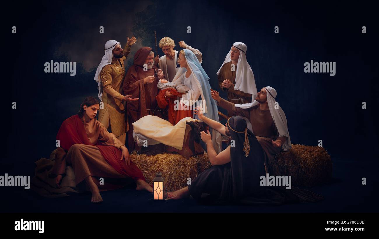 Silent holy night scene. Peaceful Nativity scene capturing the adoration of baby Jesus. Mary ...