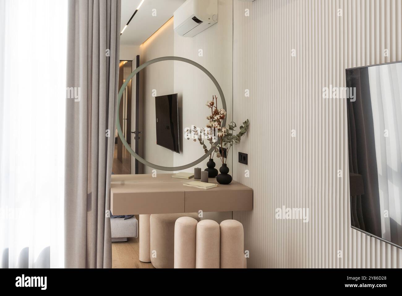 A small dressing table in one corner of the dressing room Stock Photo ...