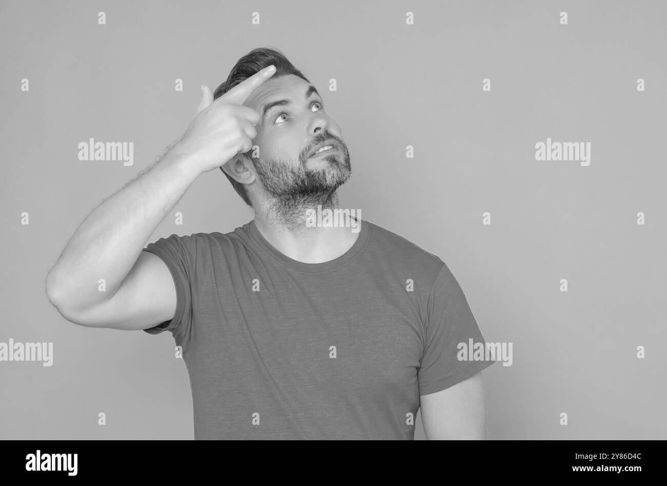 The point up. Look up. Happy handsome man pointing up away, isolated ...