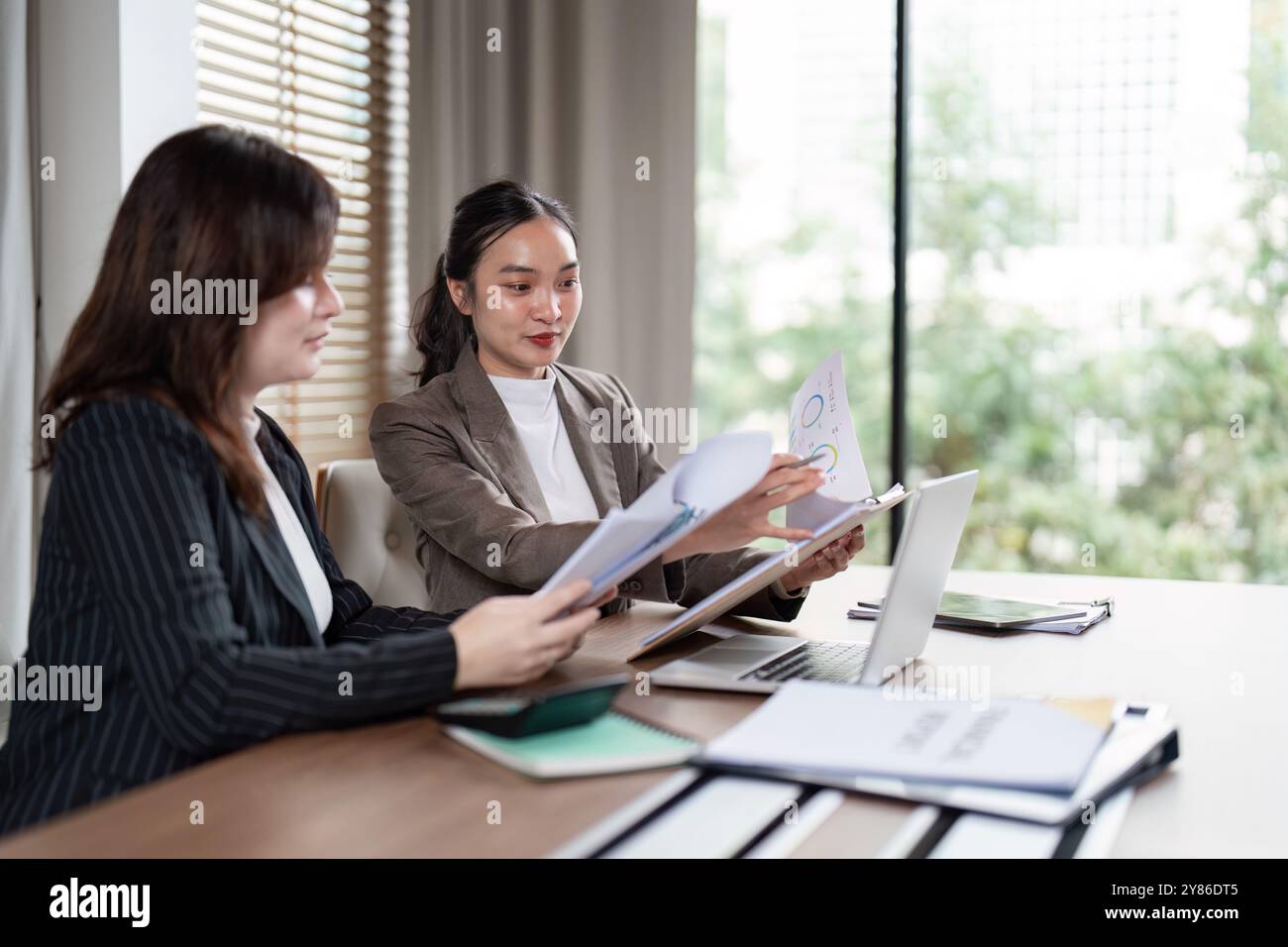 Business Team Analyzing Reports for Strategic Planning. Concept of ...