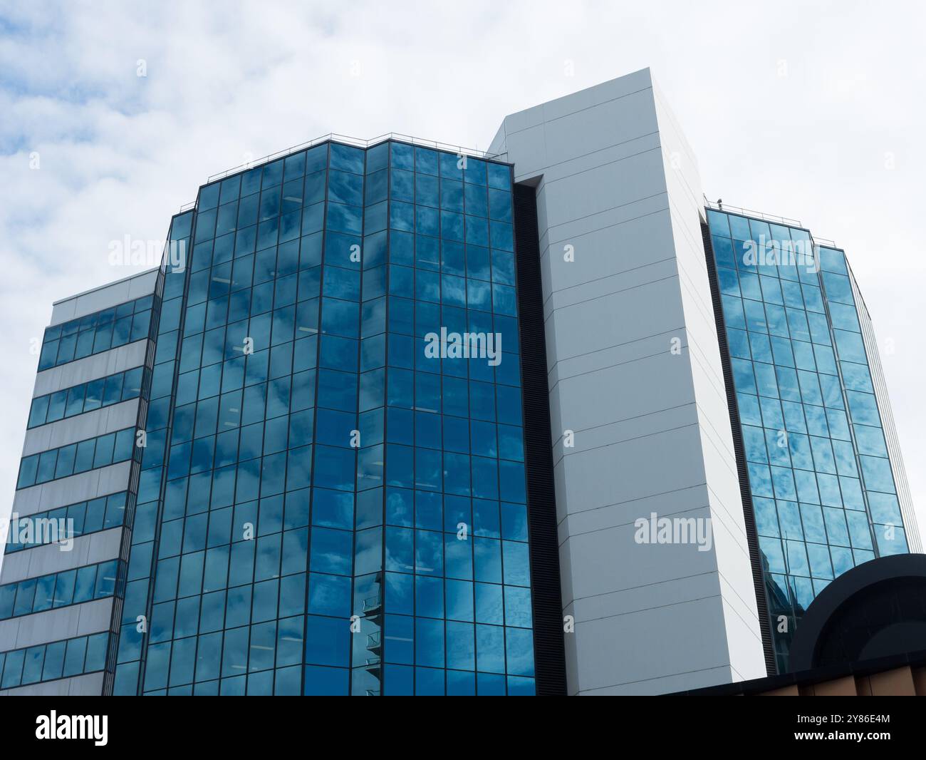 SA Health department building with reflections of clouds and blue sky ...
