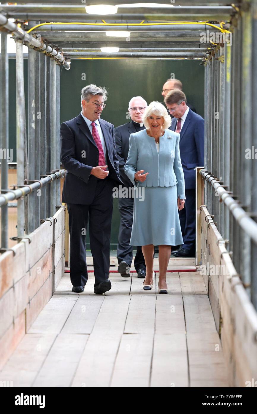Queen Camilla with architect, Ptolemy Hugo Dean (left) during a visit ...