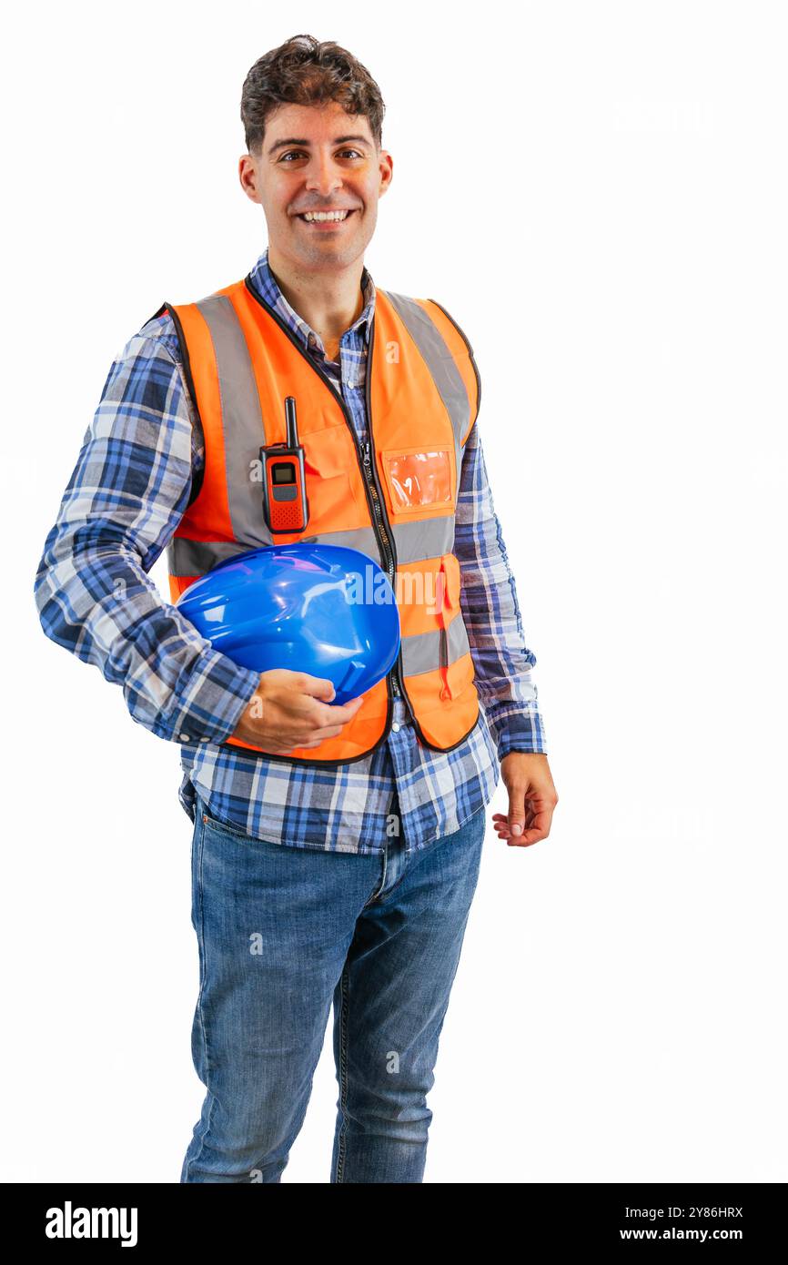 vertical cheerful construction worker dressed in an orange safety vest ...
