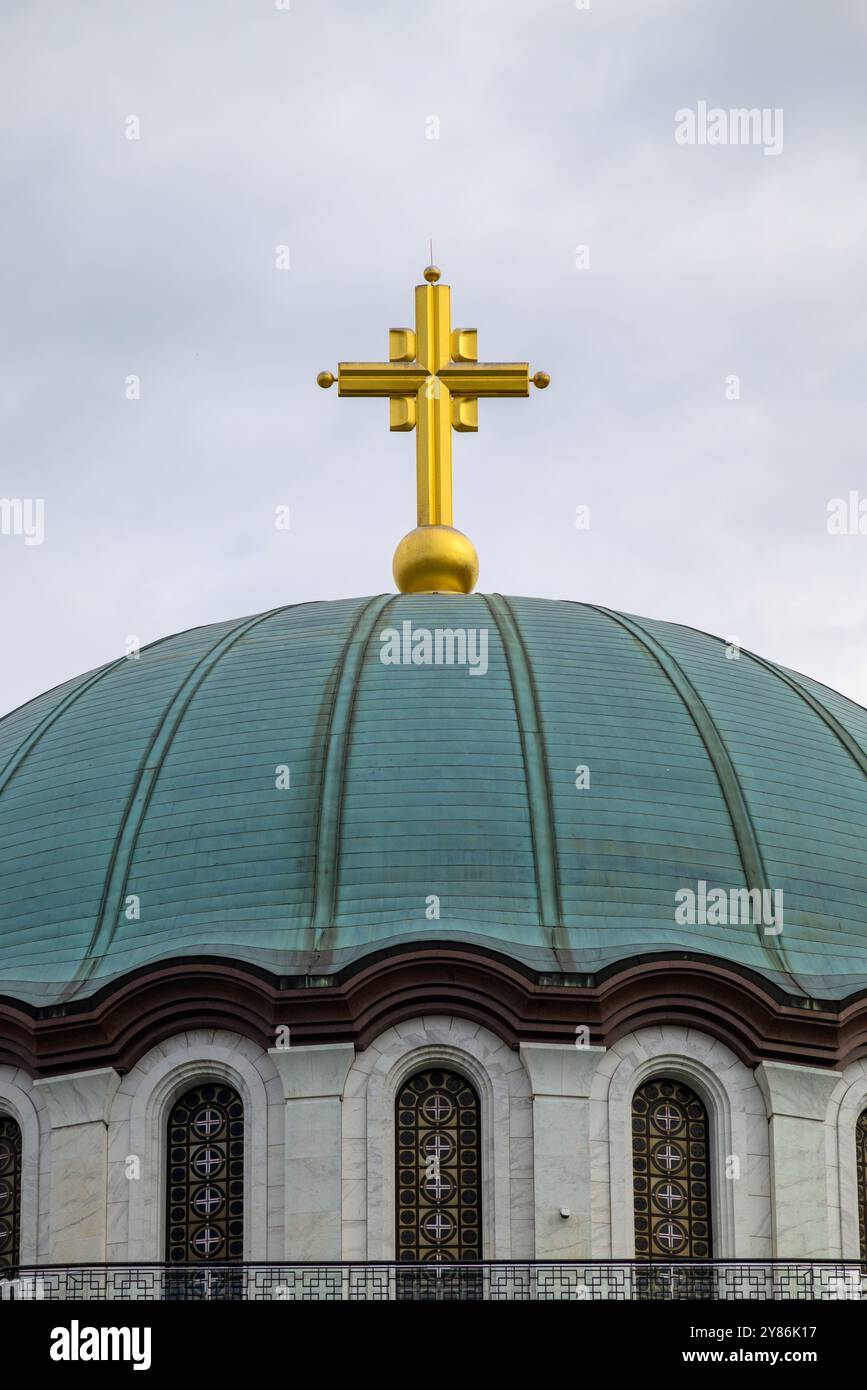 Dome of Saint Sava church with huge golden cross, one of the biggest ...