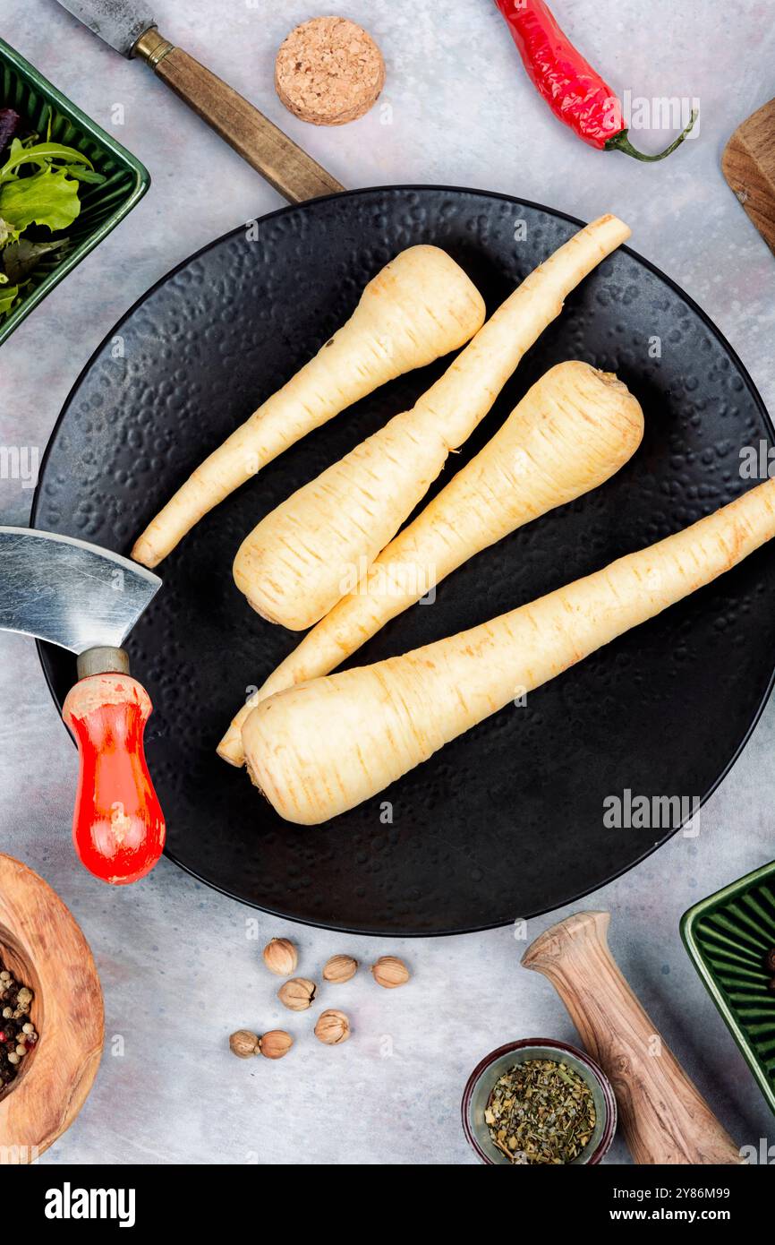 Raw and uncooked parsnips roots. Concept of healthy eating. Top view ...