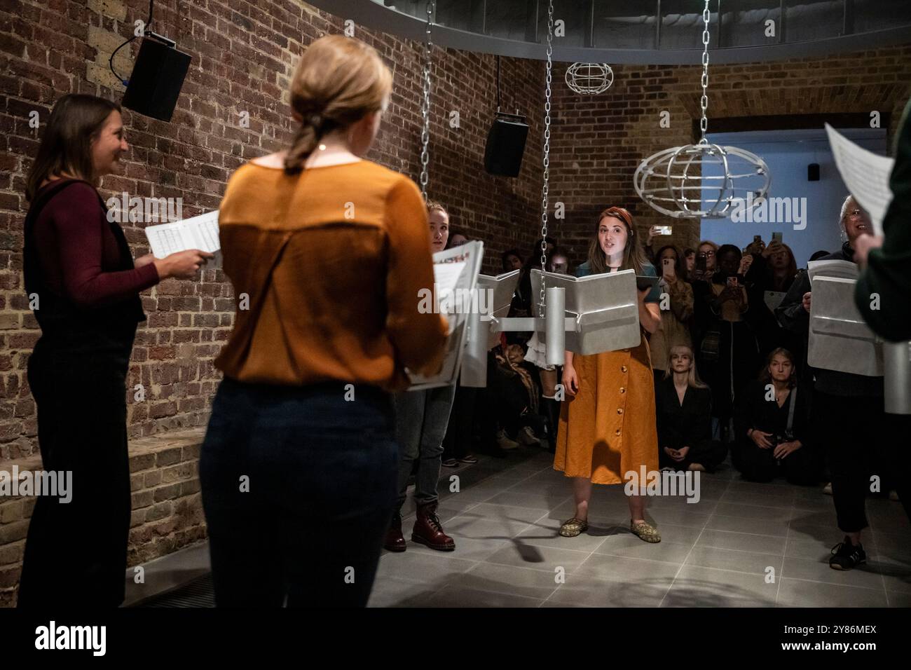 London, UK. 3 October 2024. Belfast-based HIVE Choir perform ...