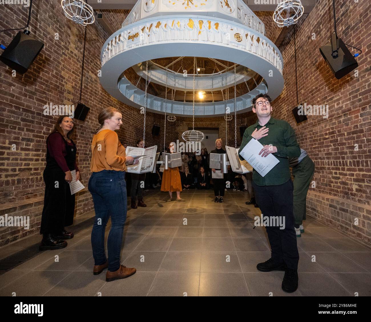 London, UK. 3 October 2024. (R) John Darcy, Director HIVE Choir, joins ...