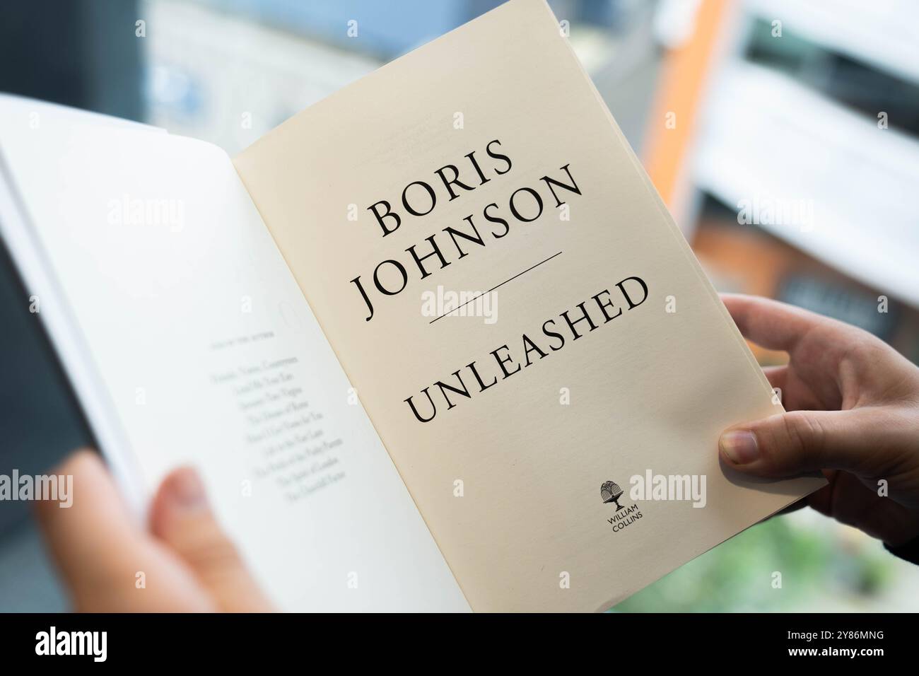A person holds a copy of former prime minister Boris Johnson's latest ...