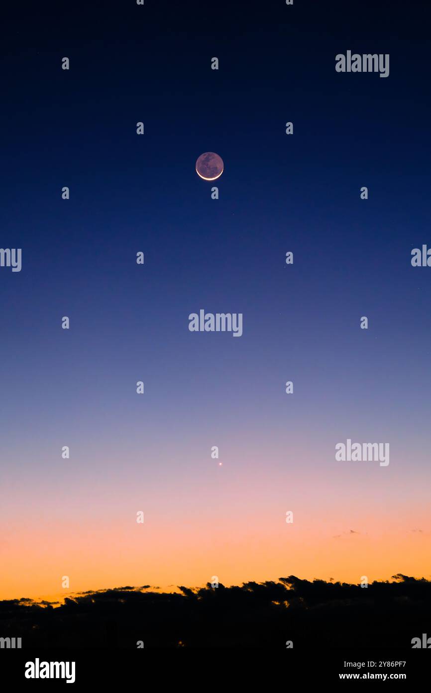 Sunset in Africa, blue hour with the moon in the blue sky. Kalahari ...