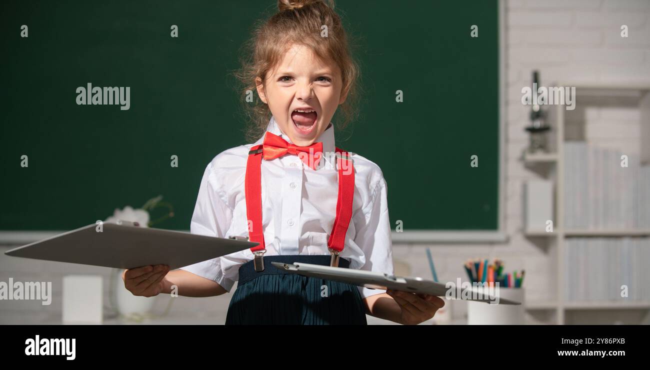 Angry school kid in class hi-res stock photography and images - Alamy