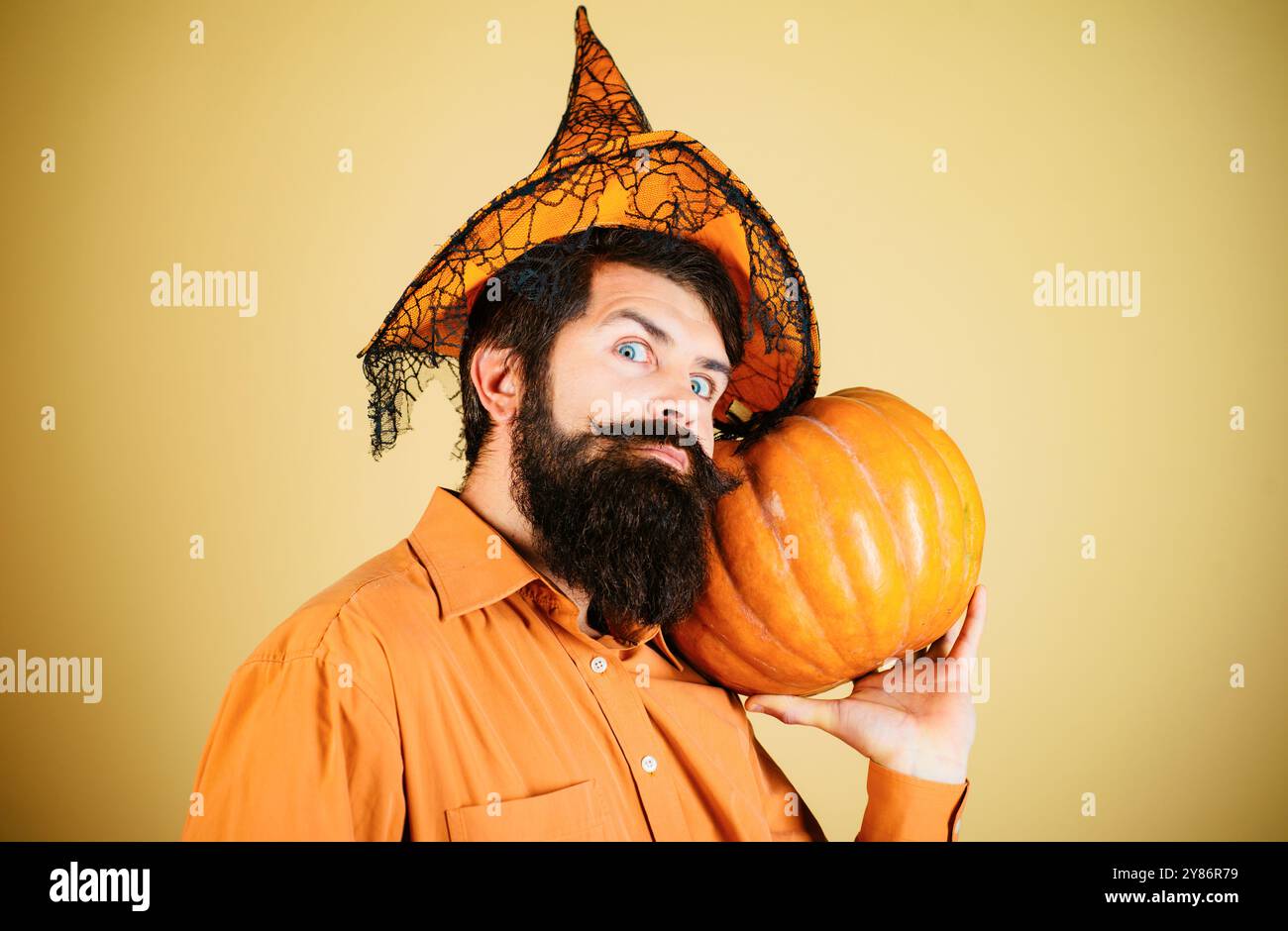 Thanksgiving seasonal cooking ingredients. Halloween Man posing with ...