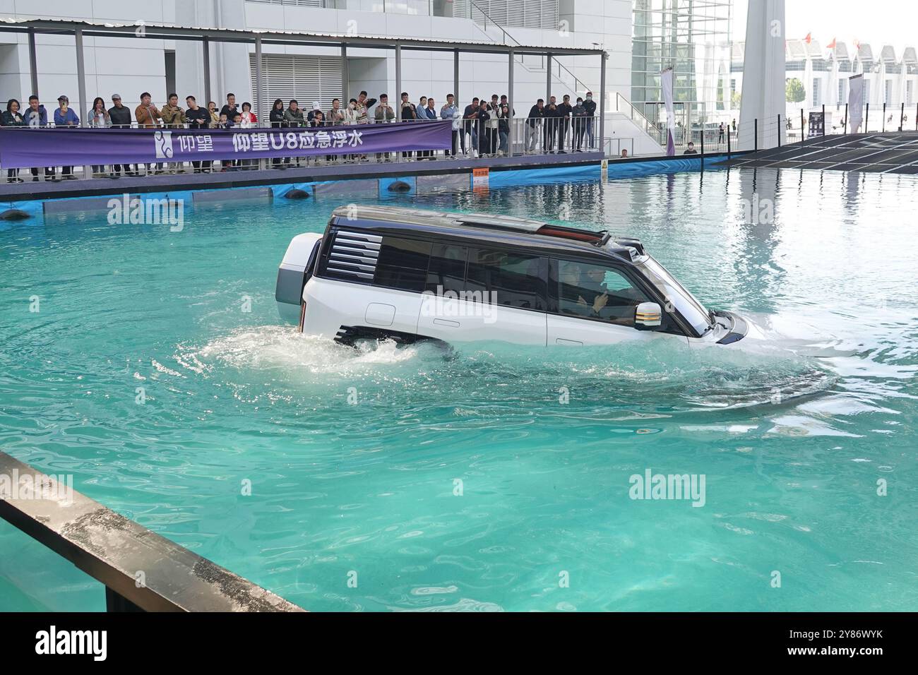 TIANJIN, CHINA - OCTOBER 3, 2024 - Visitors visit a BYD Yangwang U8 ...