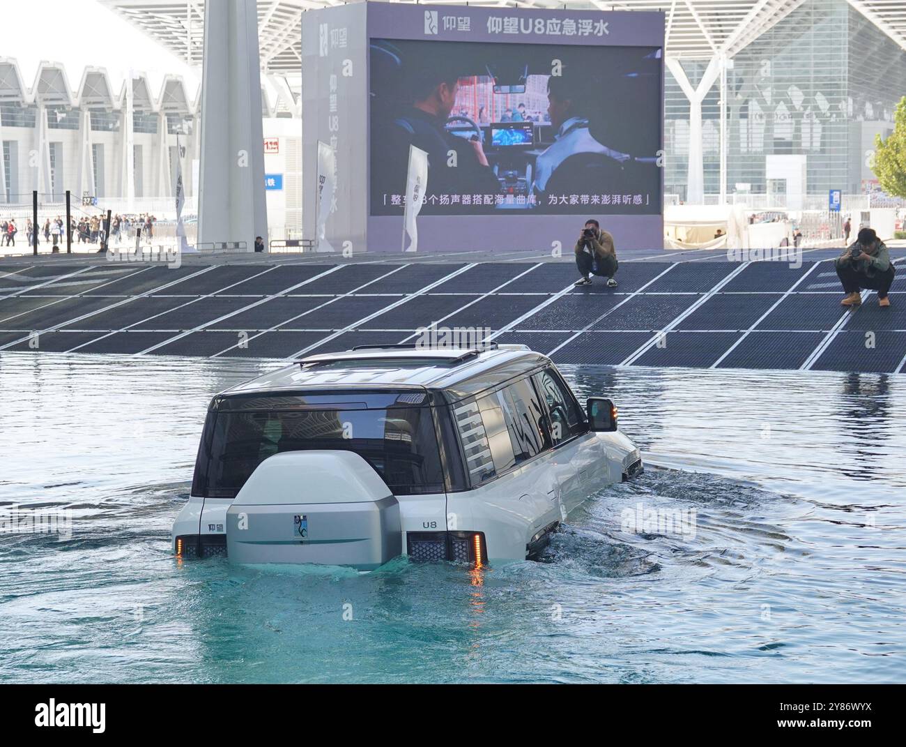 TIANJIN, CHINA - OCTOBER 3, 2024 - Visitors visit a BYD Yangwang U8 ...