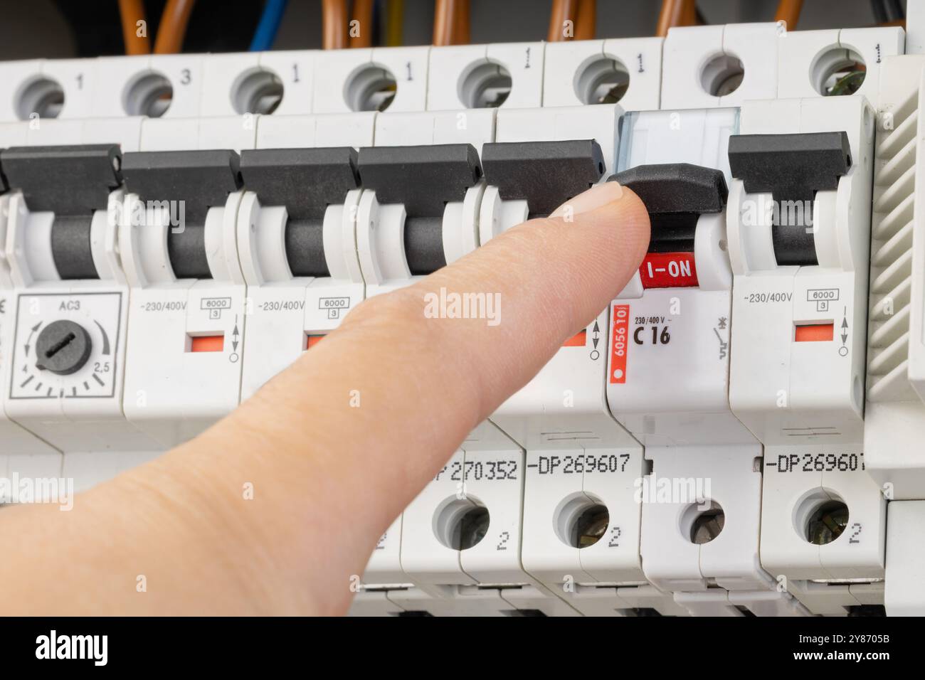 Testing circuits with probes in an electrical panel Stock Photo - Alamy