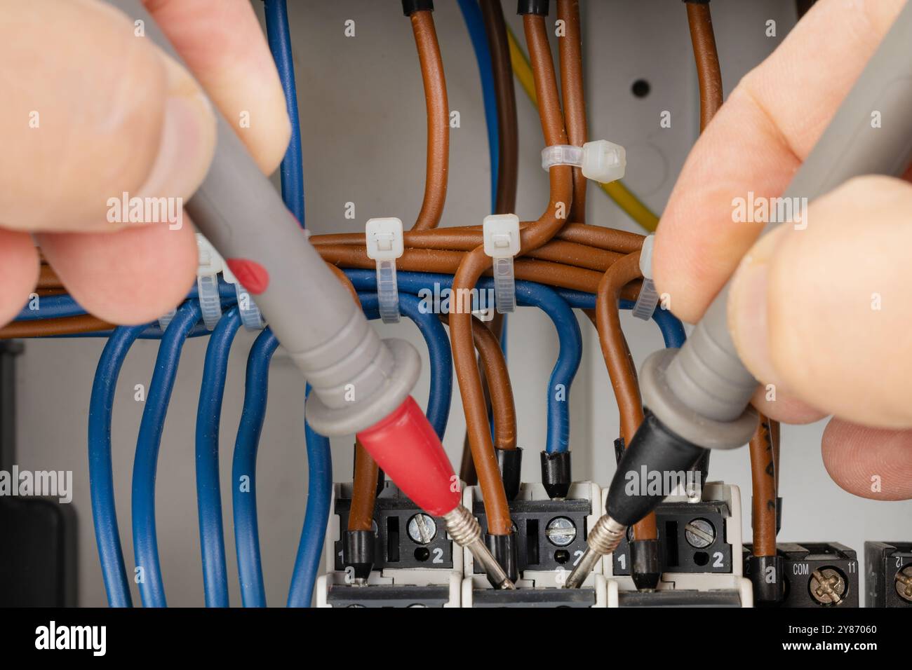 Testing electrical circuits with probes in a panel Stock Photo - Alamy
