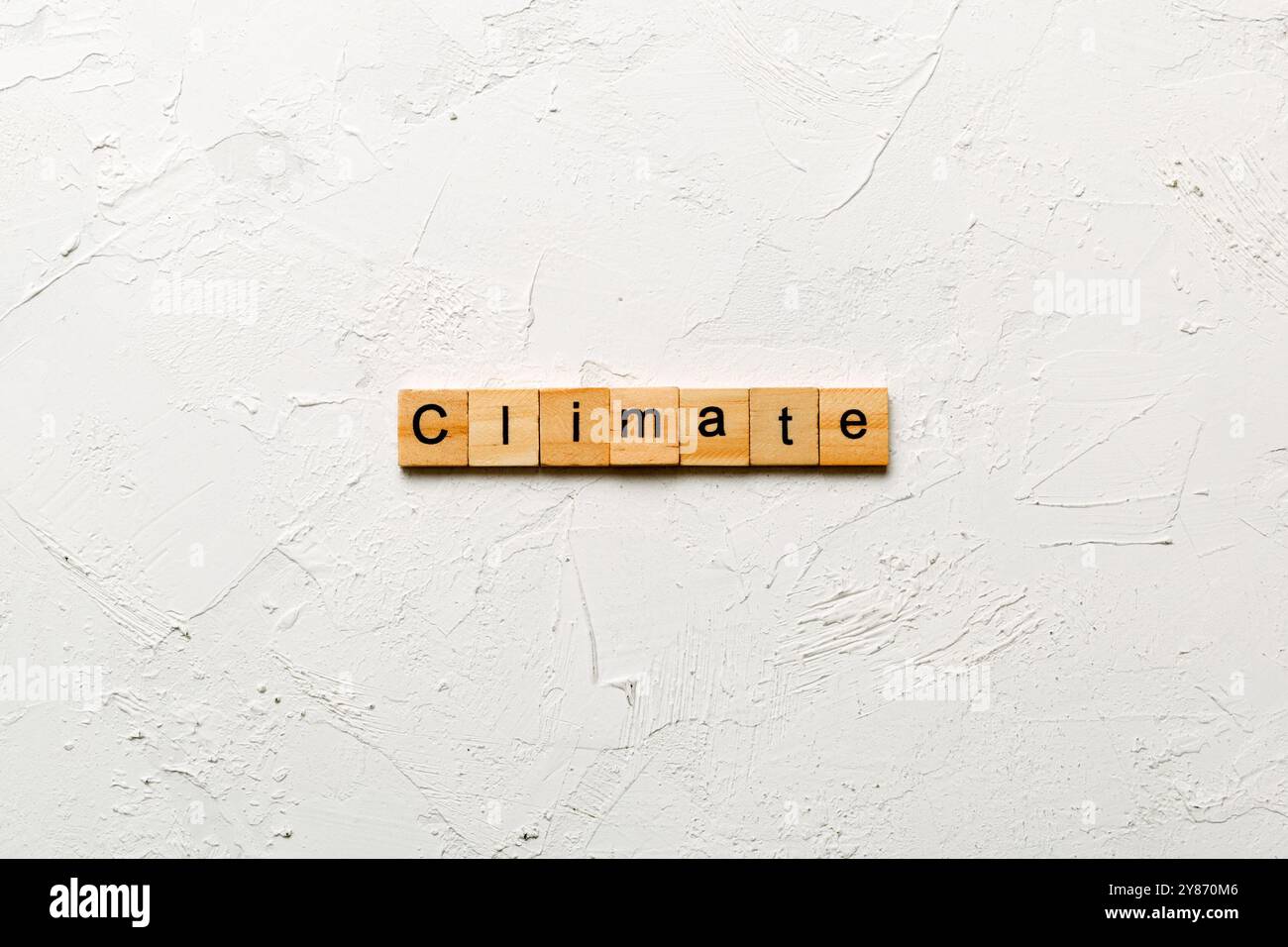 climate word written on wood block. climate text on cement table for ...