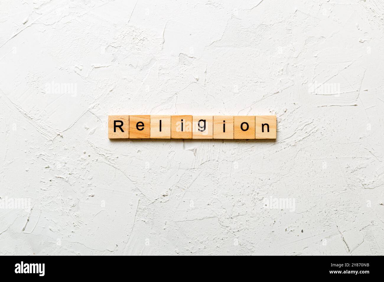Religion word written on wood block. Religion text on cement table for ...