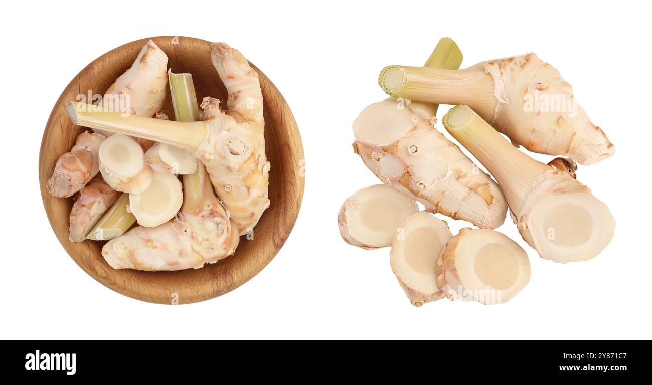 Fresh galangal root in wooden bowl isolated on white background with ...