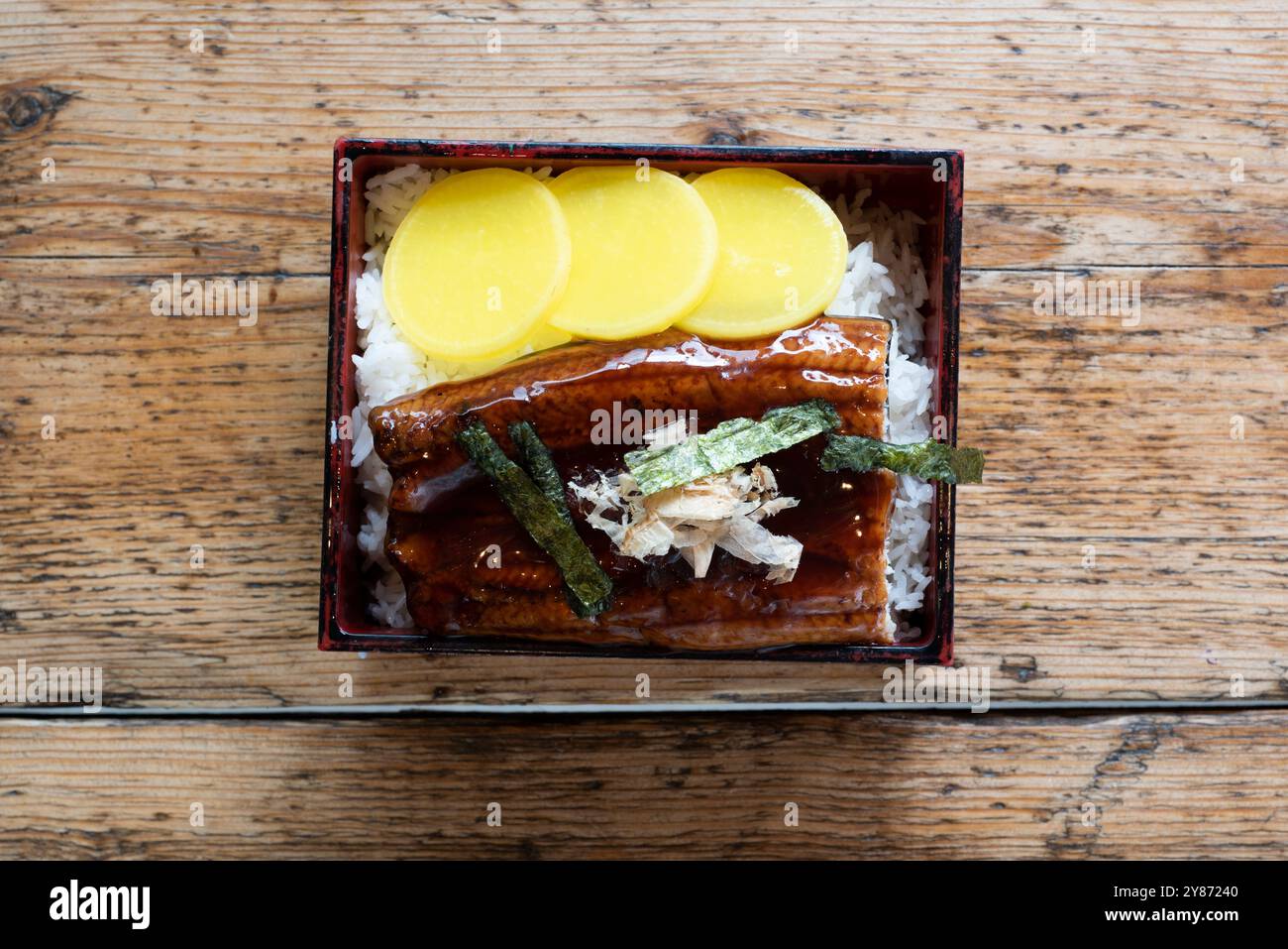 Grilled unagi freshwater eel loin served with rice, sea weed and ...