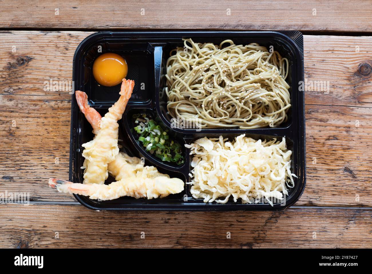 Chinese tempura battered king prawn bento box, served with noodles ...