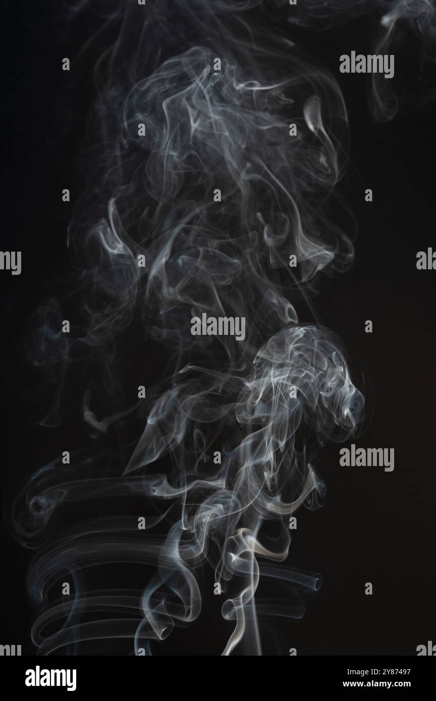 Light white smoke line swirl transparent isolated on black background ...