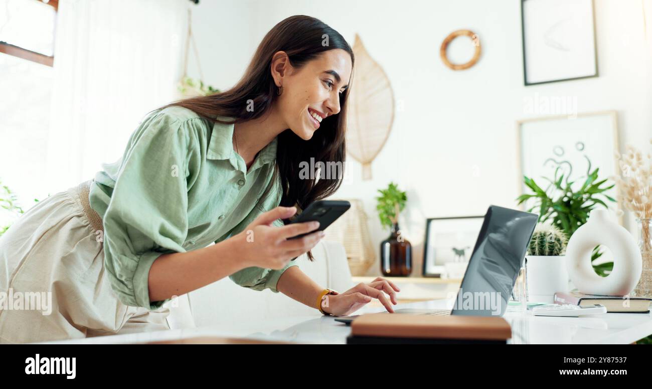 Business, woman and laptop with phone at desk for multitasking, reading ...