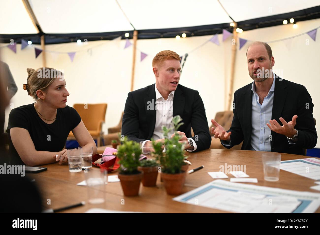 The Prince of Wales speaks with British Paralympian Louise Fiddes (left ...