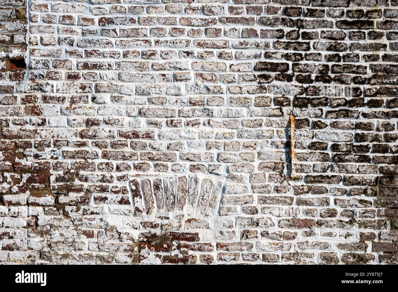 Worn texture of an old brick stone facade, Dion-le-Val, Brabant Wallon ...