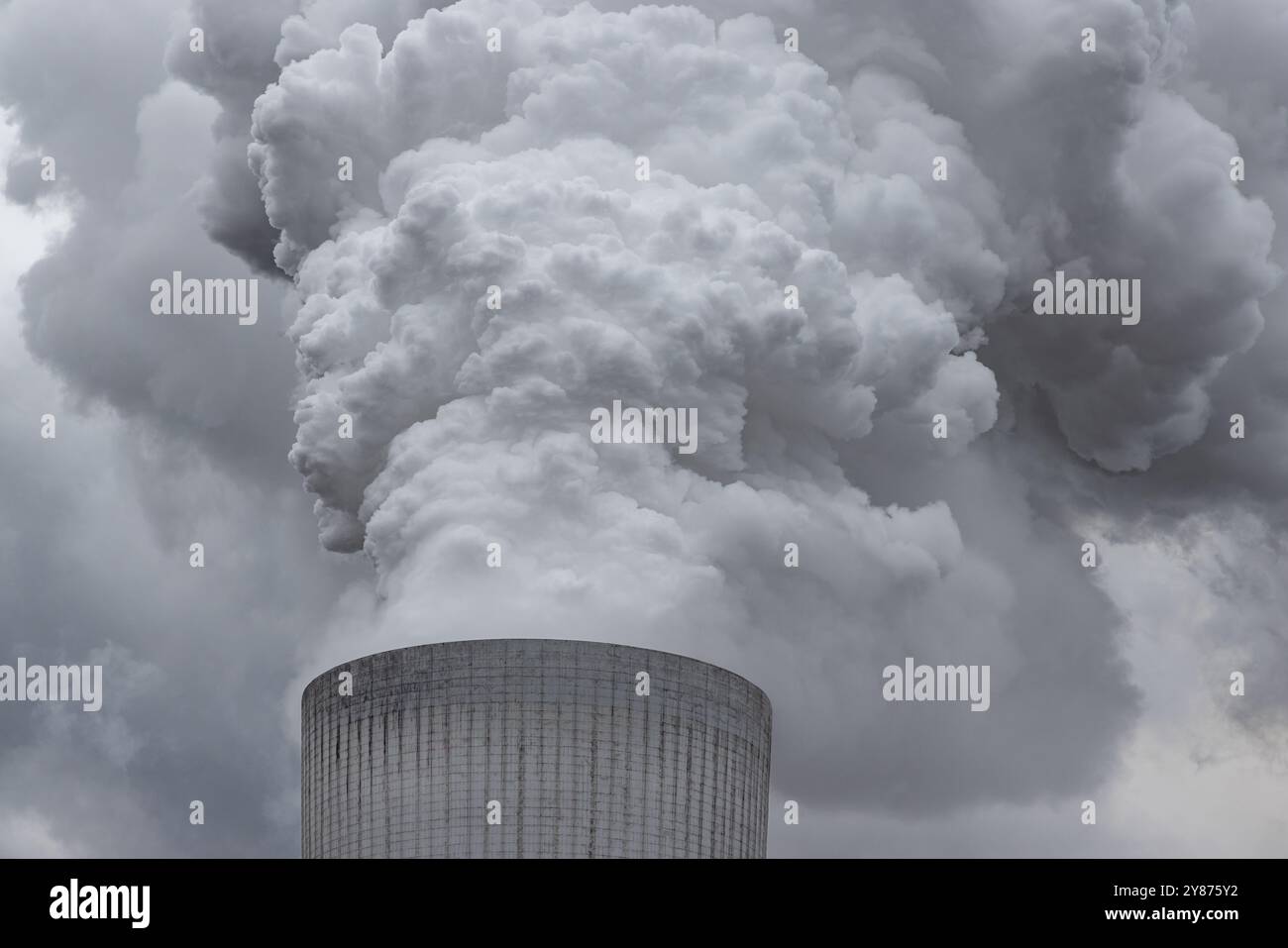Chimney of a coal power station releases huge clouds of smoke into the ...
