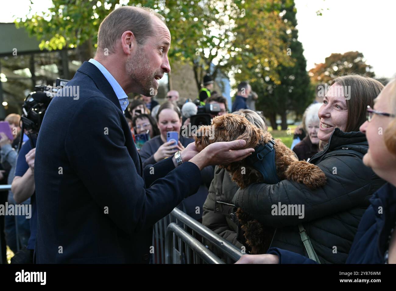The Prince of Wales speaks with members of the public as he arrives for ...