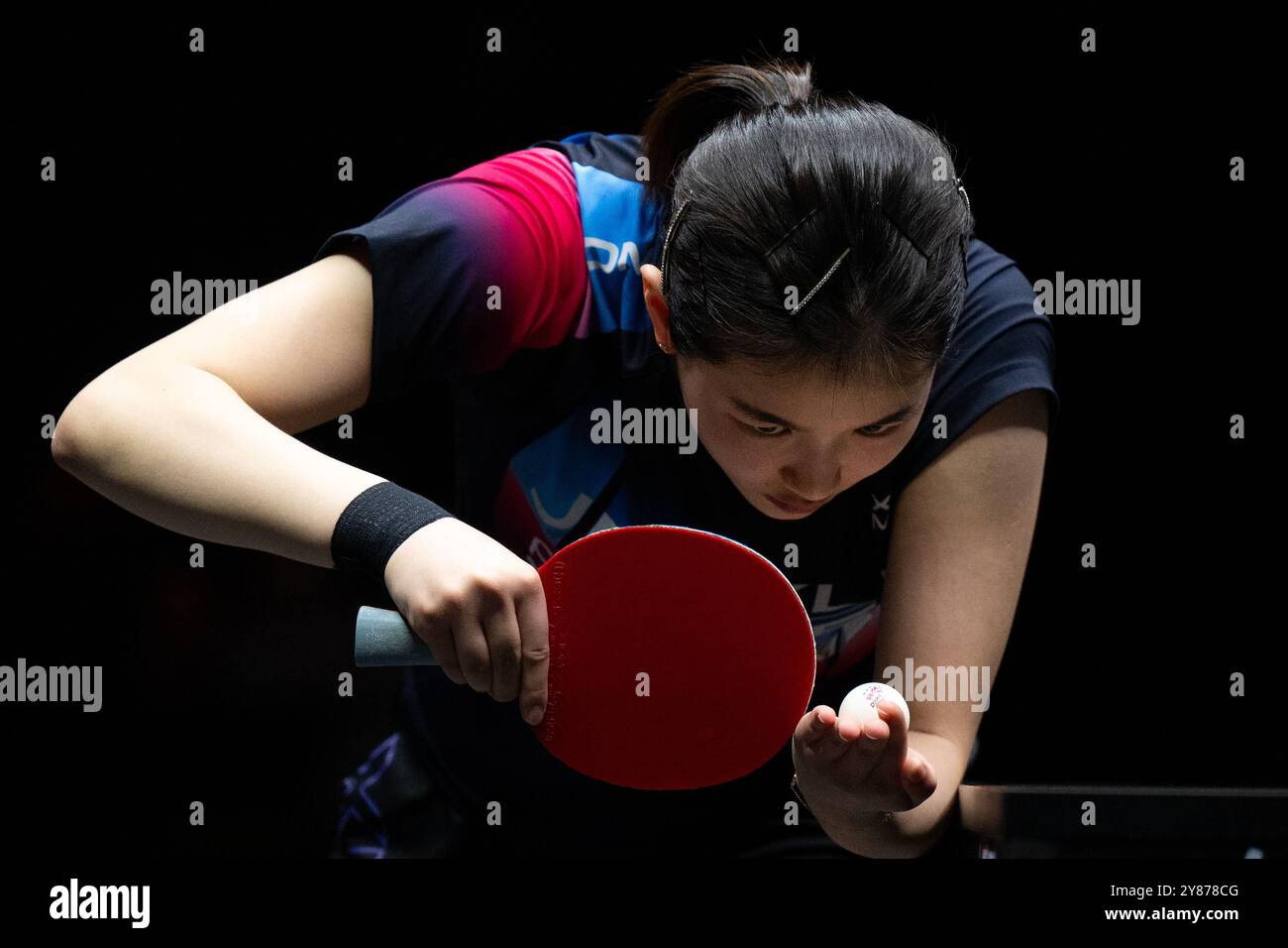 Beijing, China. 3rd Oct, 2024. Kim Nayeong of South Korea serves to Ito Mima of Japan during the ...