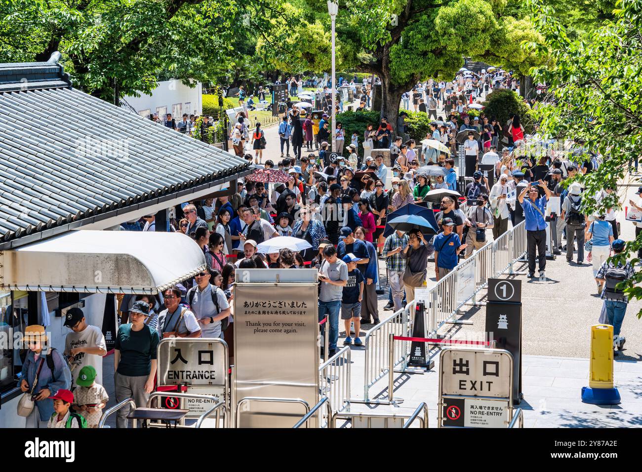 Osaka, Japan - 05.05.2024: Tourists standing in line at the entrance of ...