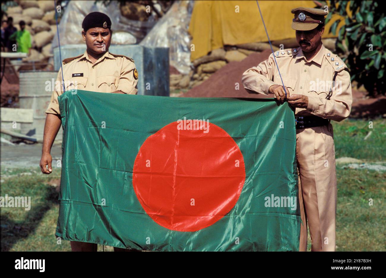 Bangladesh, Dhaka, military police holding the Bangladeshi flag Stock ...