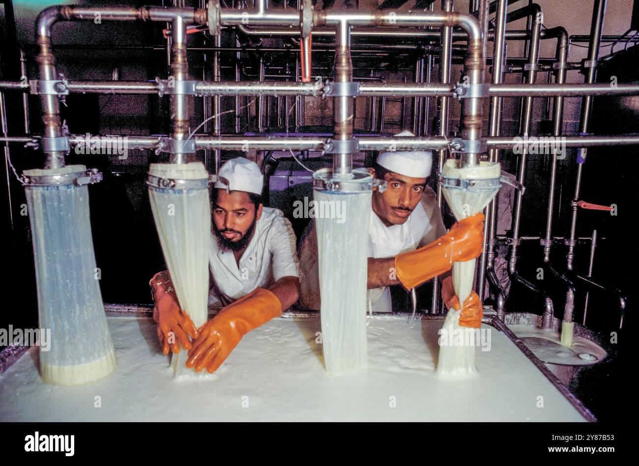 Bangladesh, Dakha, workers in a dairy factory Stock Photo - Alamy