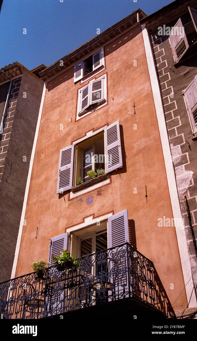 house facades in medieval alpine village of Entrevaux in Southern ...