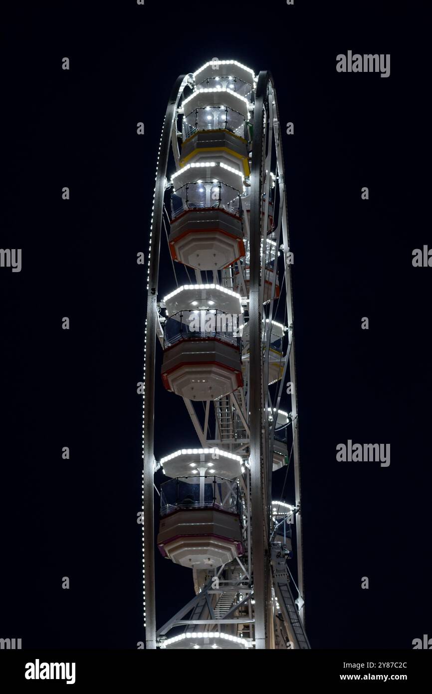 Vintage style Ferris wheel with illuminated gondolas. Night Stock Photo ...