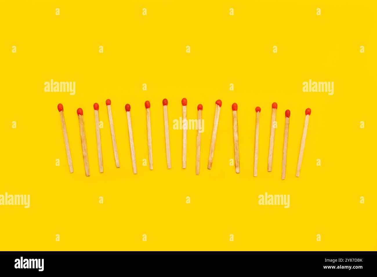 Wooden matches sticks on a yellow background with copy space Stock ...