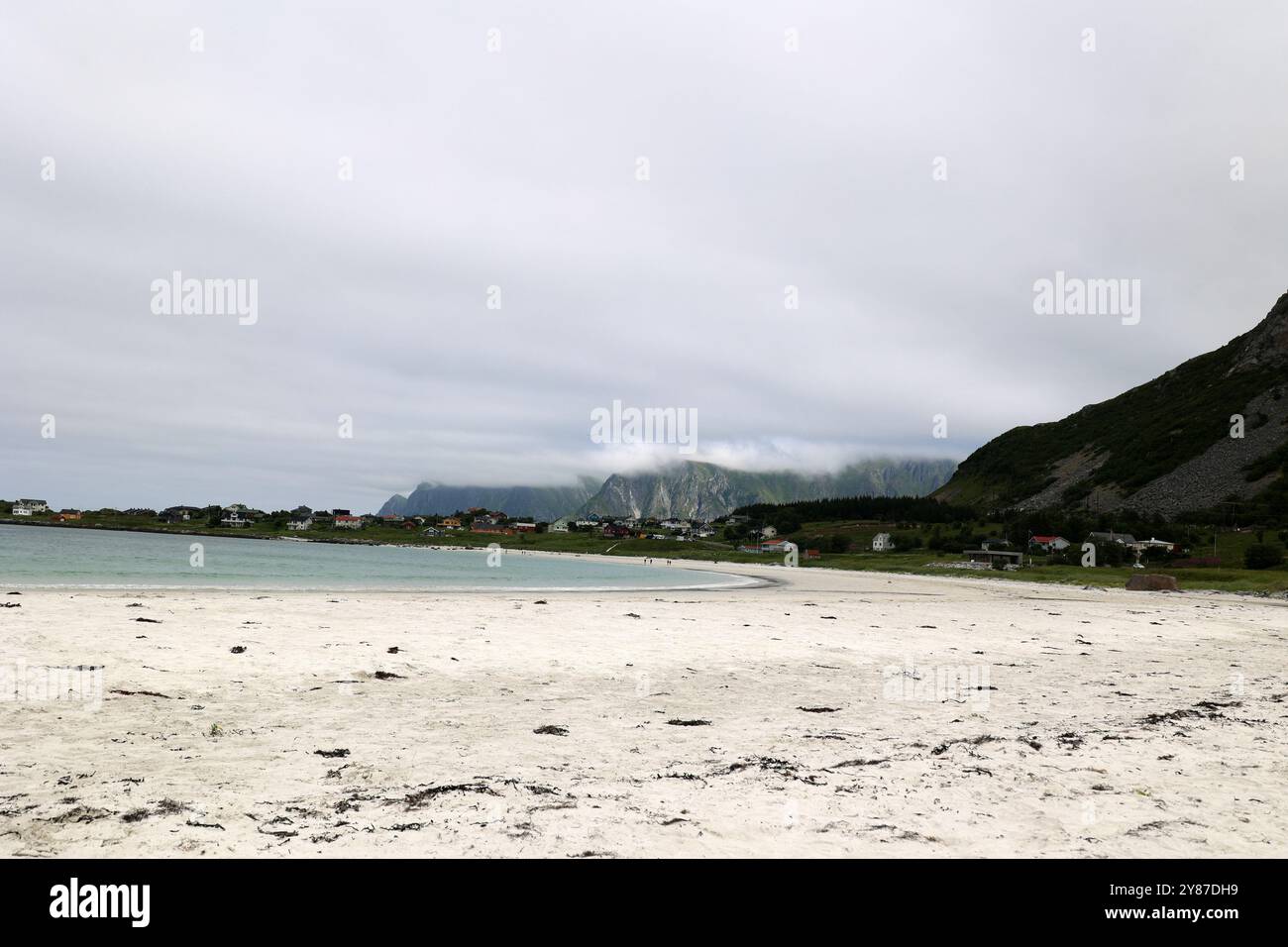 Coastal landscape with white beach of the small community Flakstad on ...