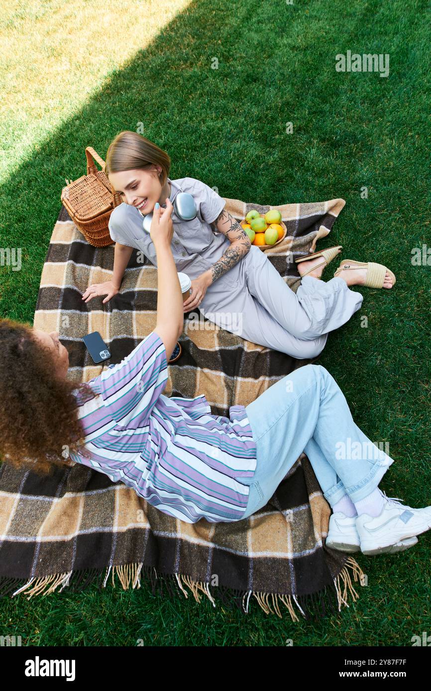 Two friends share snacks on hi-res stock photography and images - Alamy