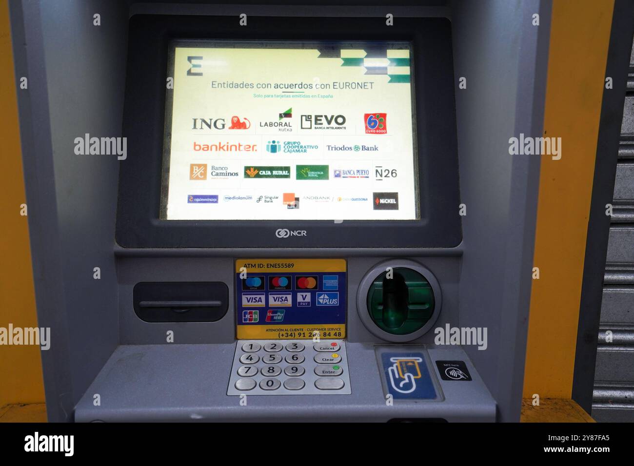 Barcelona, Spain, October 2nd 2024: ATM cash machine shown outside of a ...