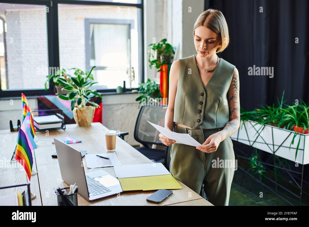 woman collaborates in an open office, fostering inclusivity and ...