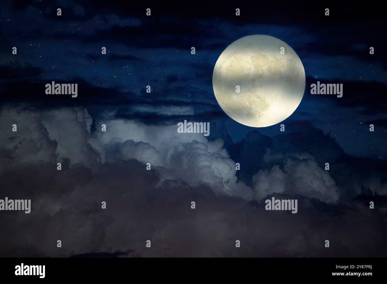 Cloudy full moon night with stars Stock Photo - Alamy