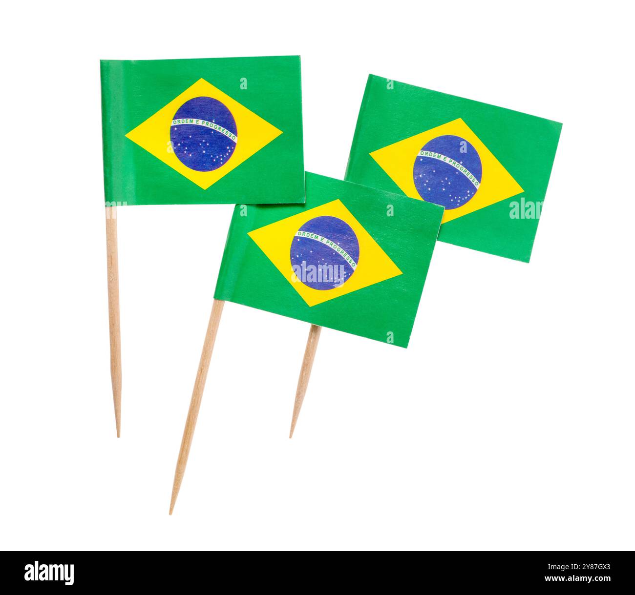Small paper flags of Brazil isolated on white Stock Photo - Alamy