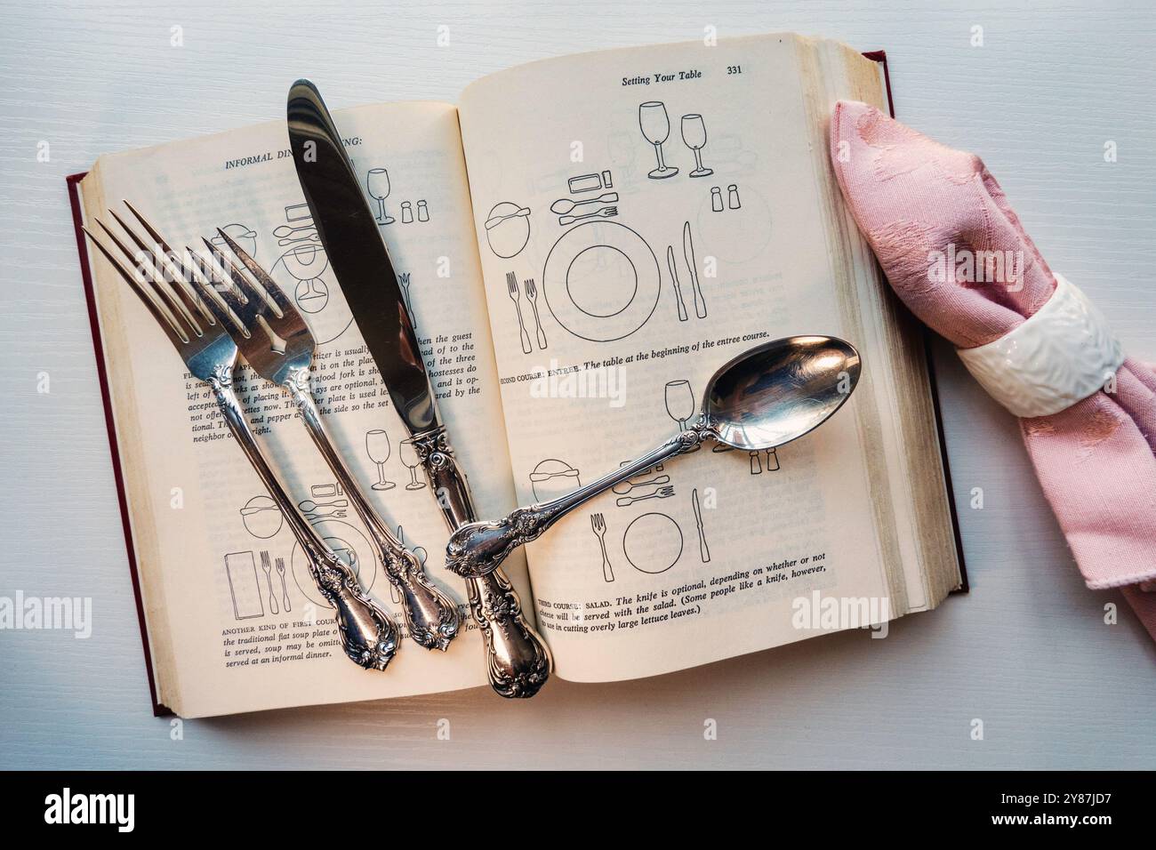 Close-up of Amy Vanderbilt's complete book on etiquette and place ...