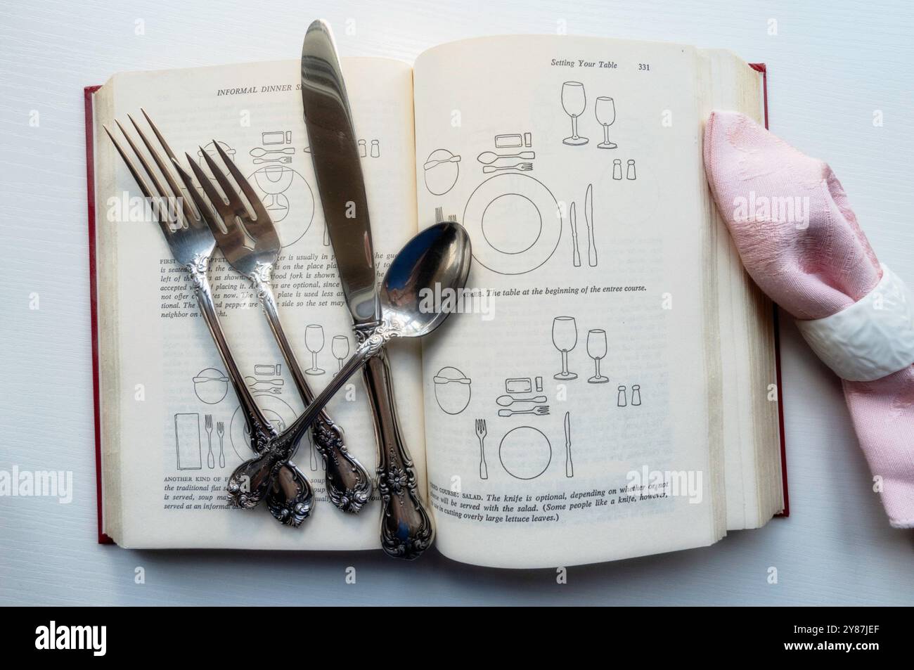 Close-up of Amy Vanderbilt's complete book on etiquette and place ...